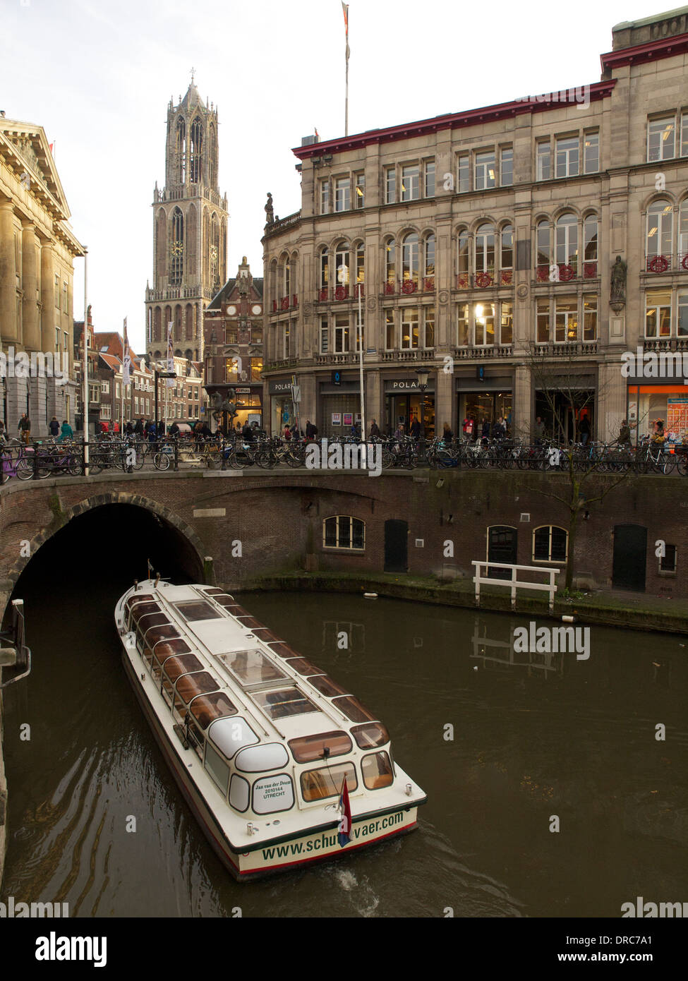 Utrecht city center with tourist cruise boat in the Oude Gracht canal ...