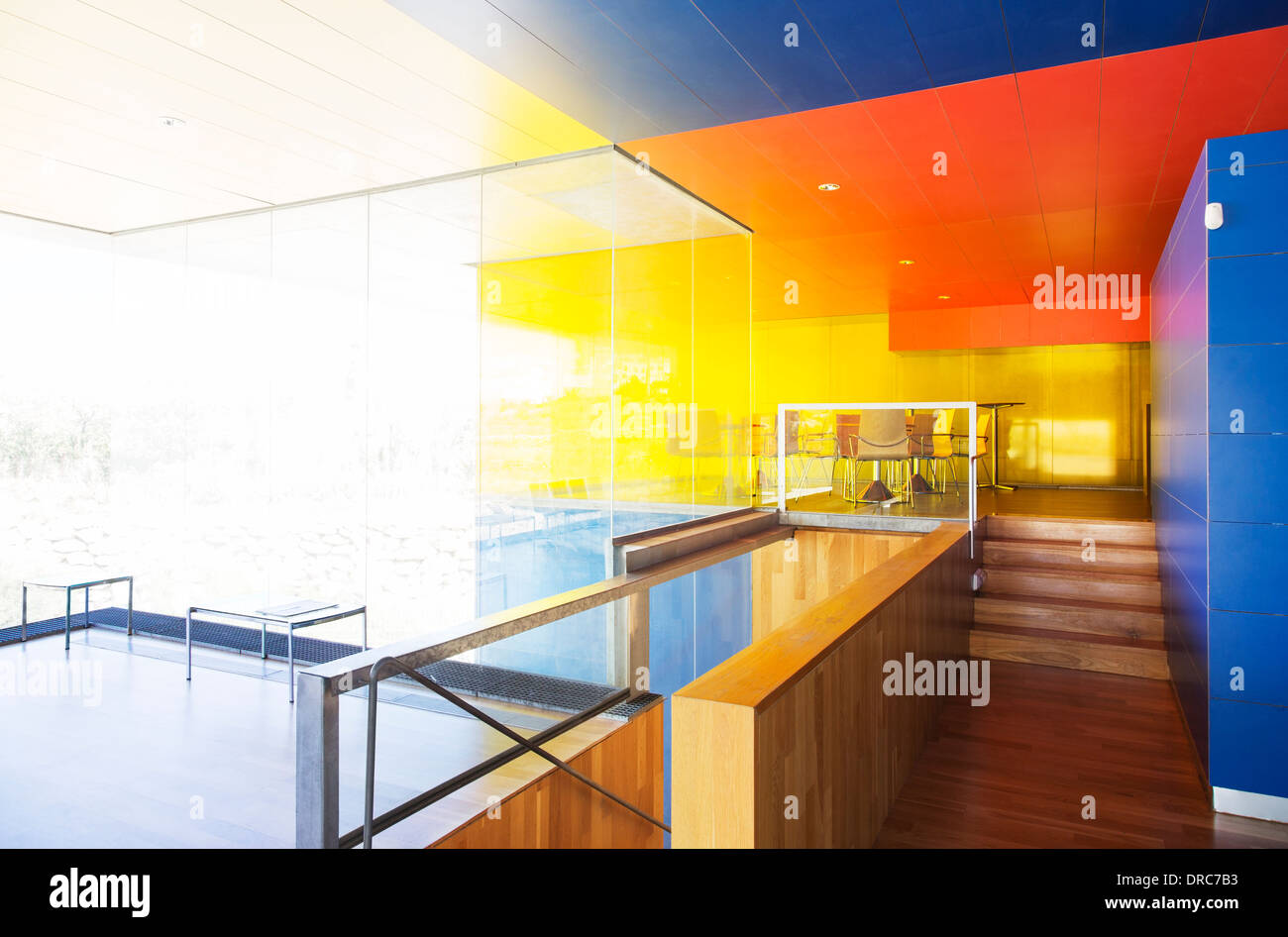 Sun shining through windows in bright office Stock Photo - Alamy