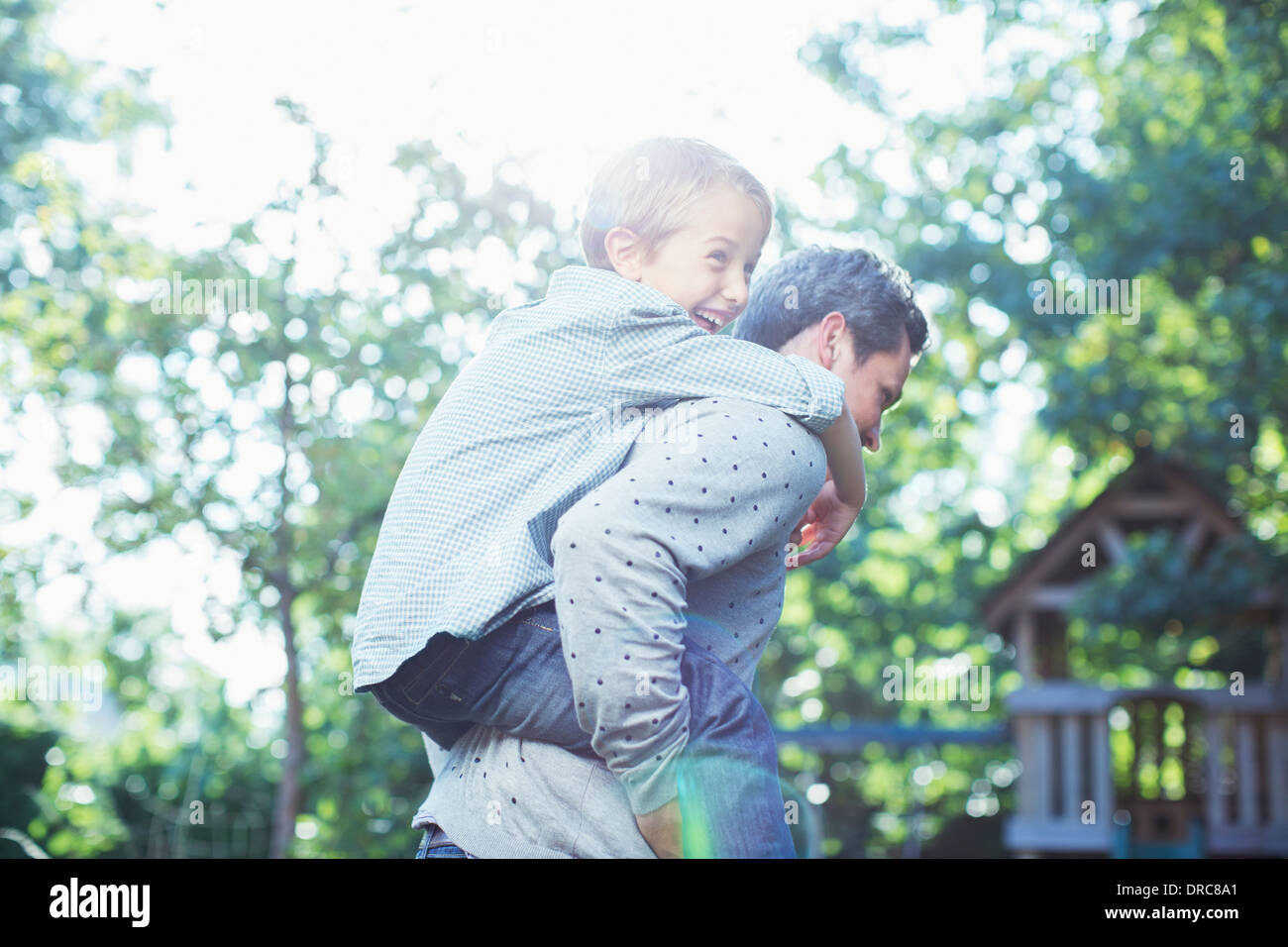 Father carrying his son hi-res stock photography and images - Alamy