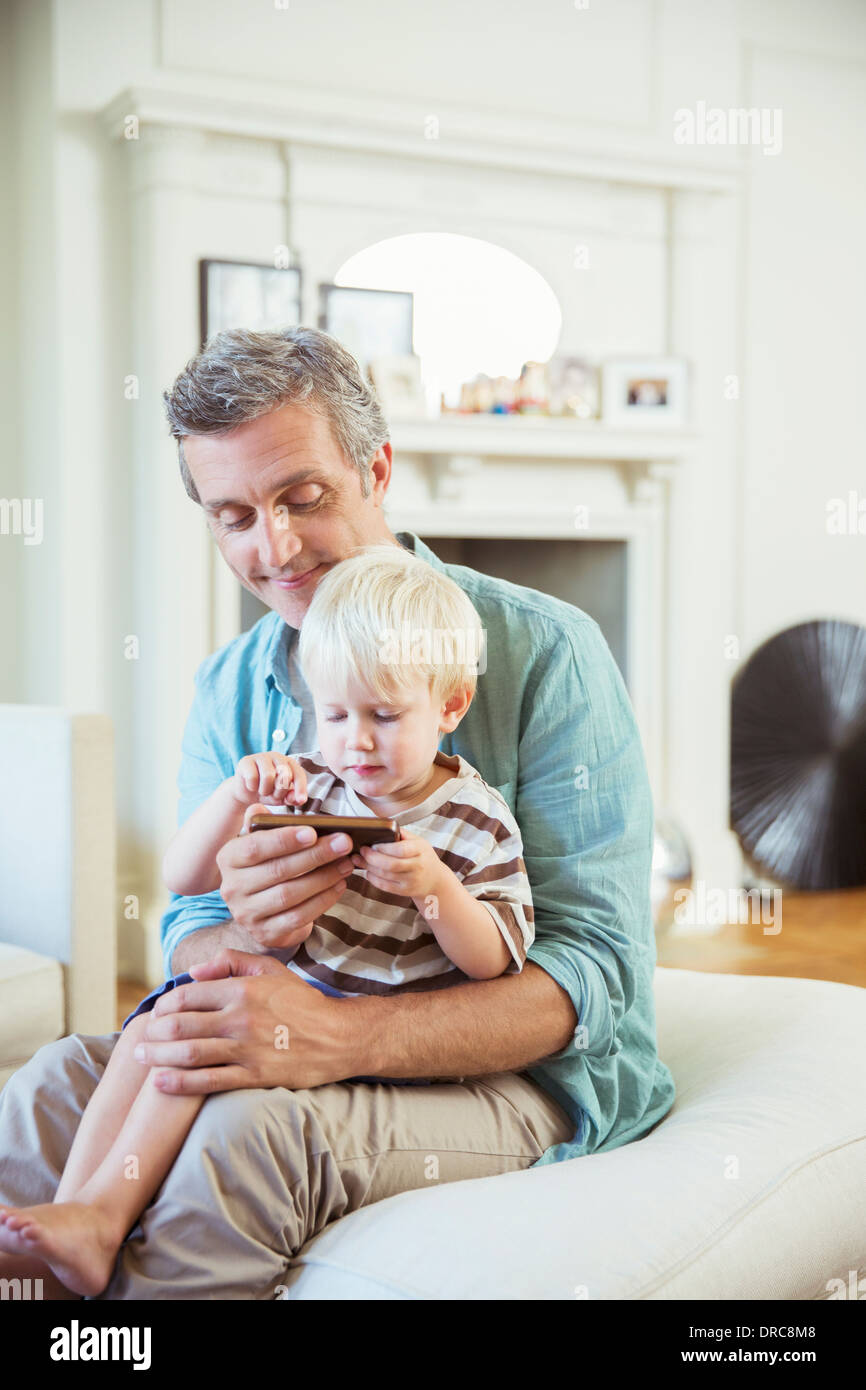 Father texting children color in hi-res stock photography and images ...