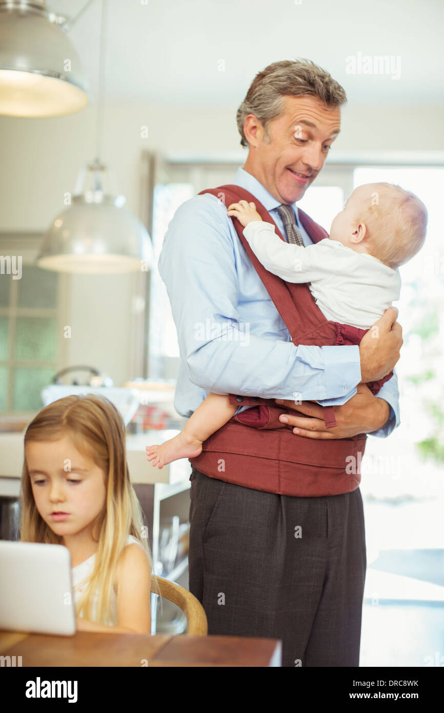 Father using tablet children in hi-res stock photography and images - Alamy