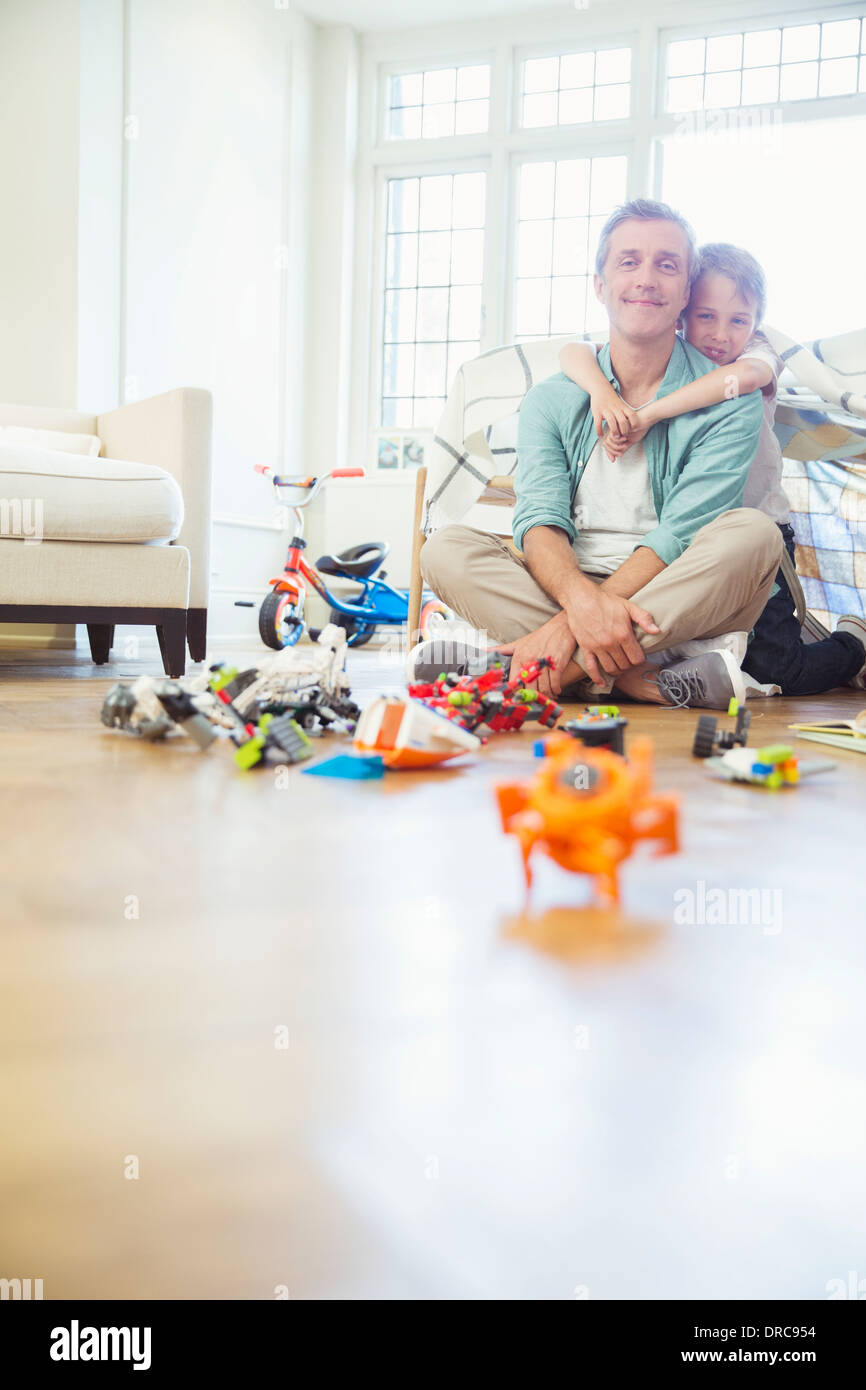 Father and son playing together Stock Photo - Alamy