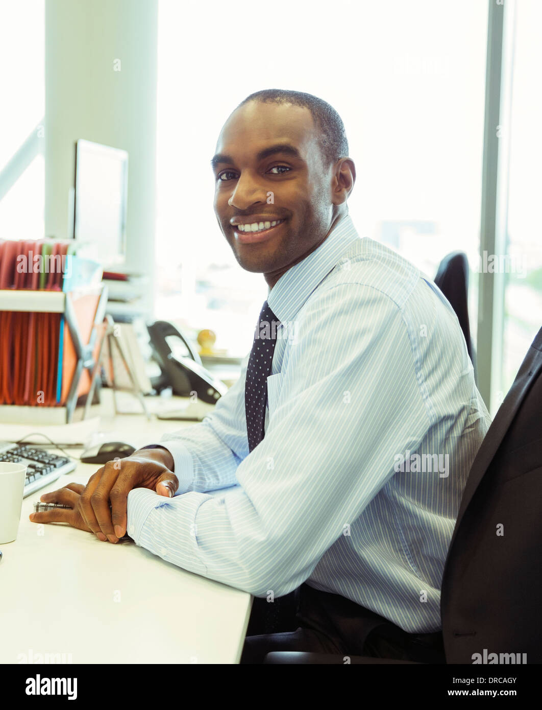 African american businessman smiling office hi-res stock photography ...