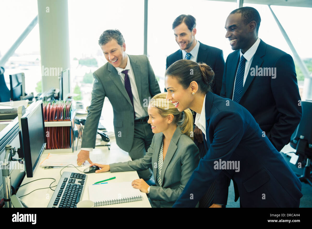 Business people working at computer in office Stock Photo - Alamy