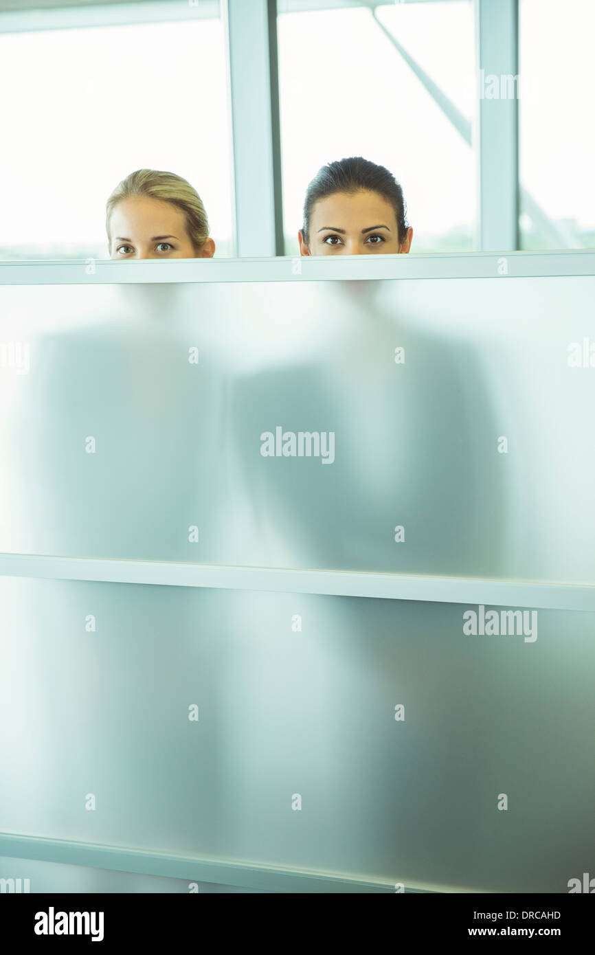 Woman Peeking Over Wall High Resolution Stock Photography and Images ...