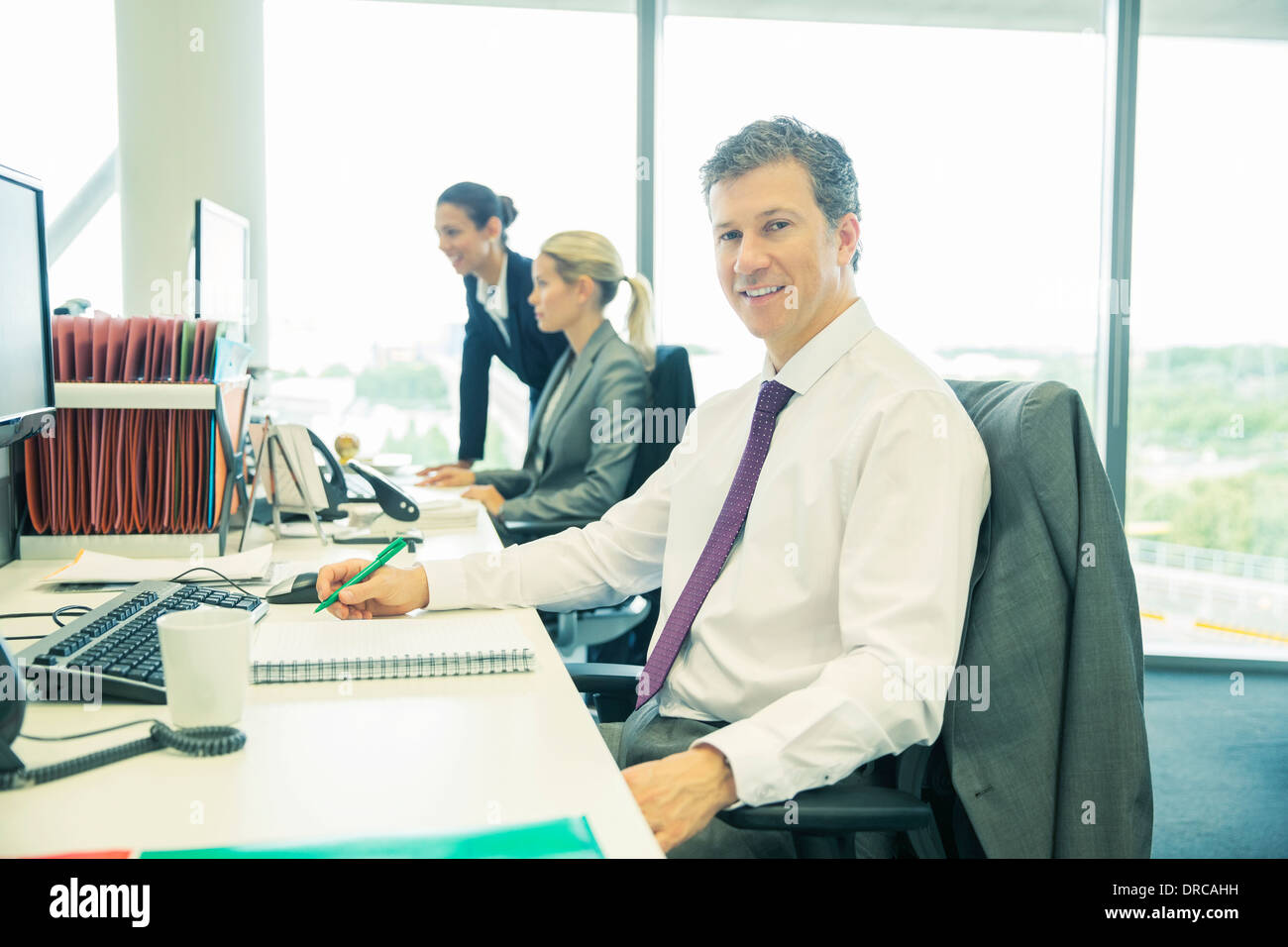 50 men working desk hi-res stock photography and images - Alamy