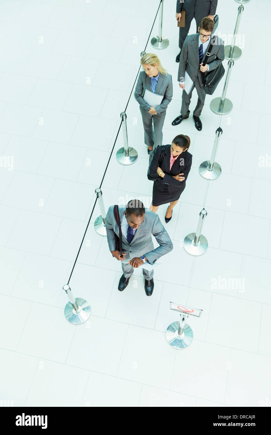 Waiting in a line hi-res stock photography and images - Alamy