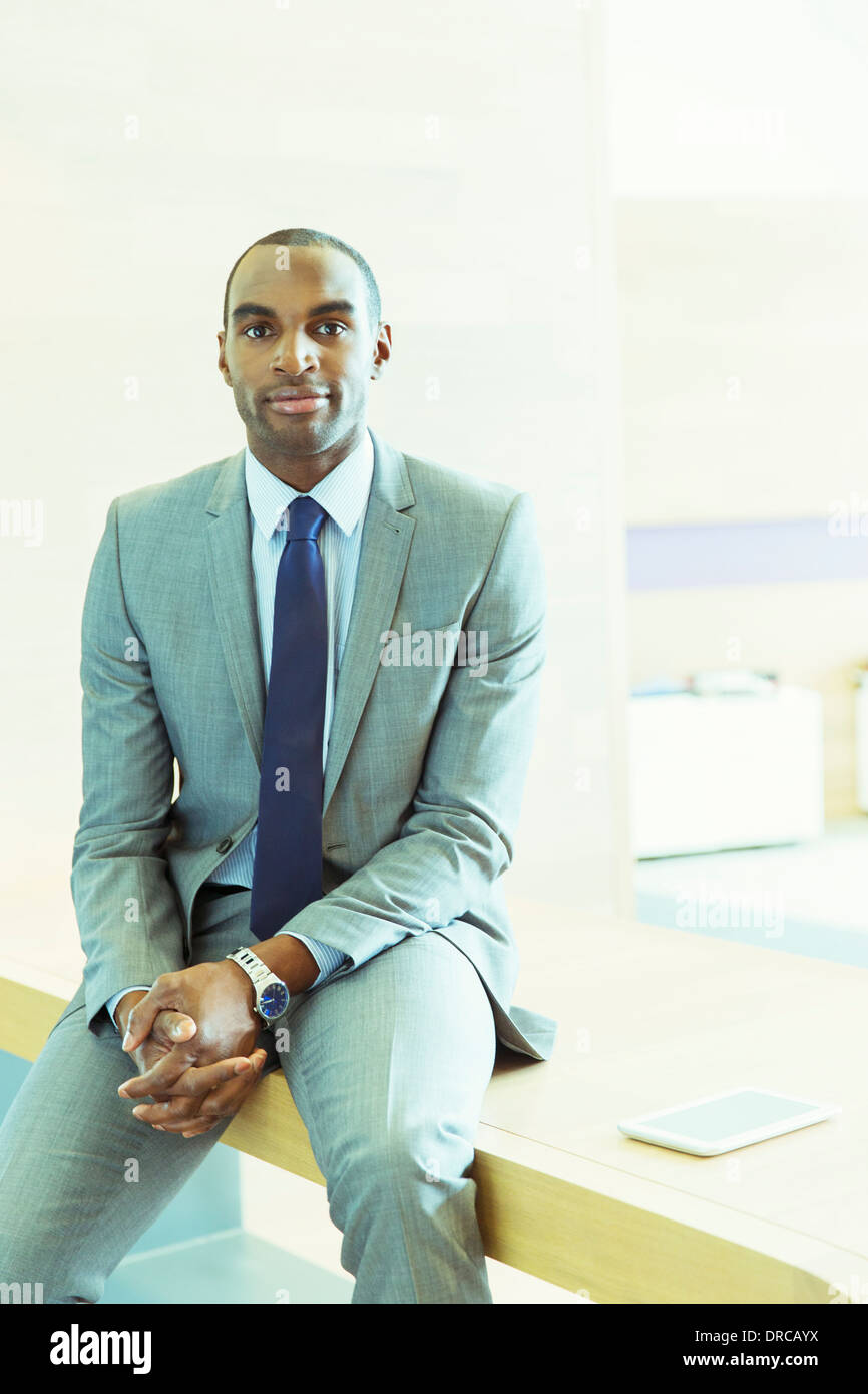 Positive businessman sitting workplace hi-res stock photography and ...