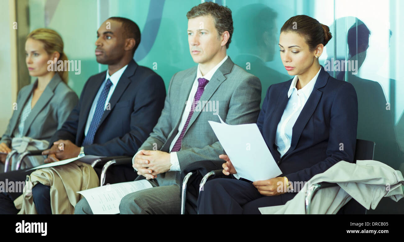 Woman sitting waiting in hi-res stock photography and images - Alamy