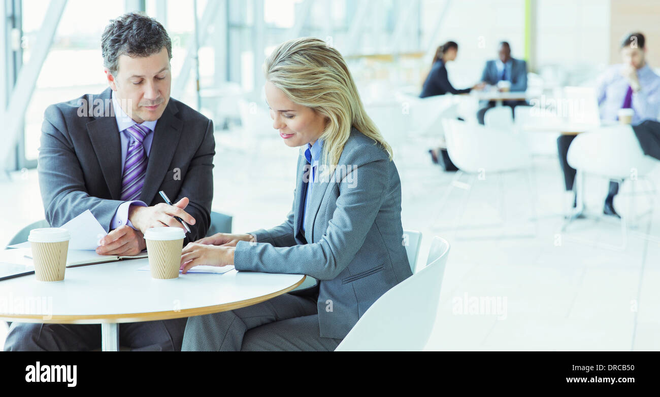 Business people talking in cafe Stock Photo - Alamy