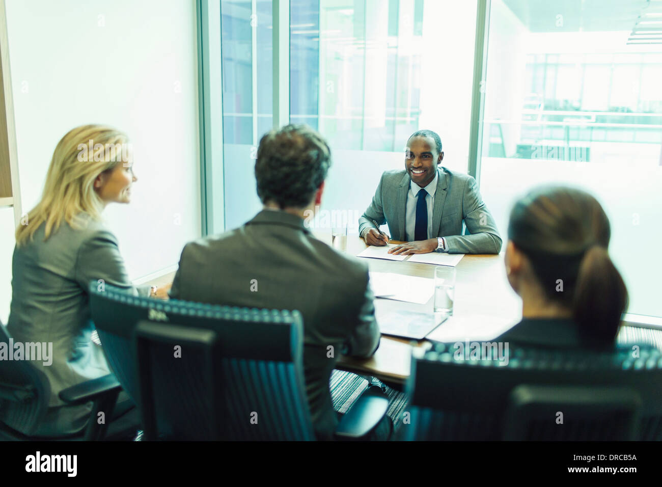 Business people talking in meeting Stock Photo - Alamy
