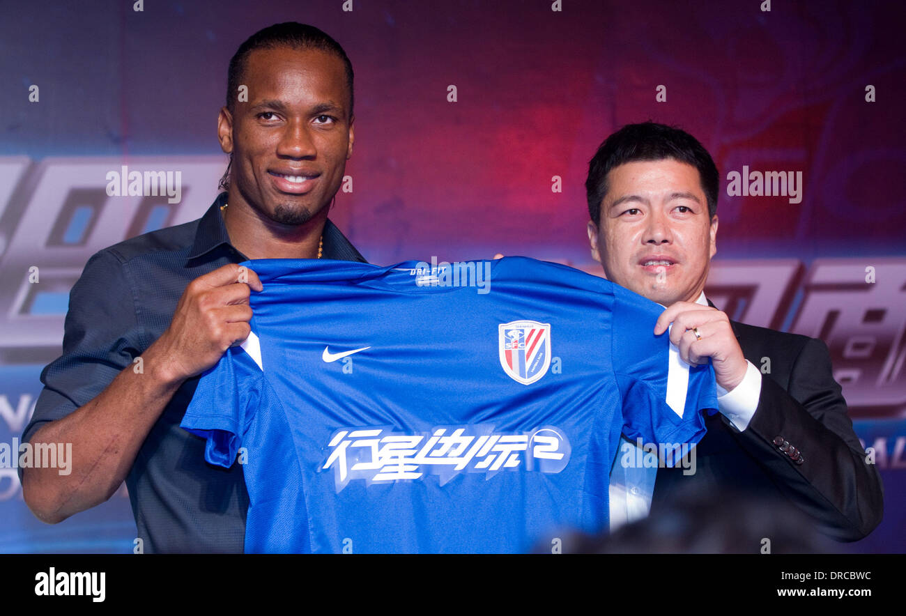 Didier Drogba and club director Zhou Jun Didier Drogba attends a press ...