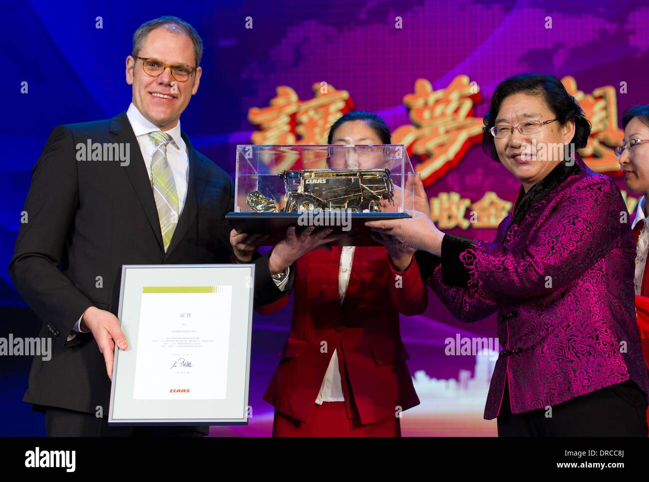 Gaomi, China. 23rd Jan, 2014. HANDOUT - Henry Puhl, member of the Claas ...