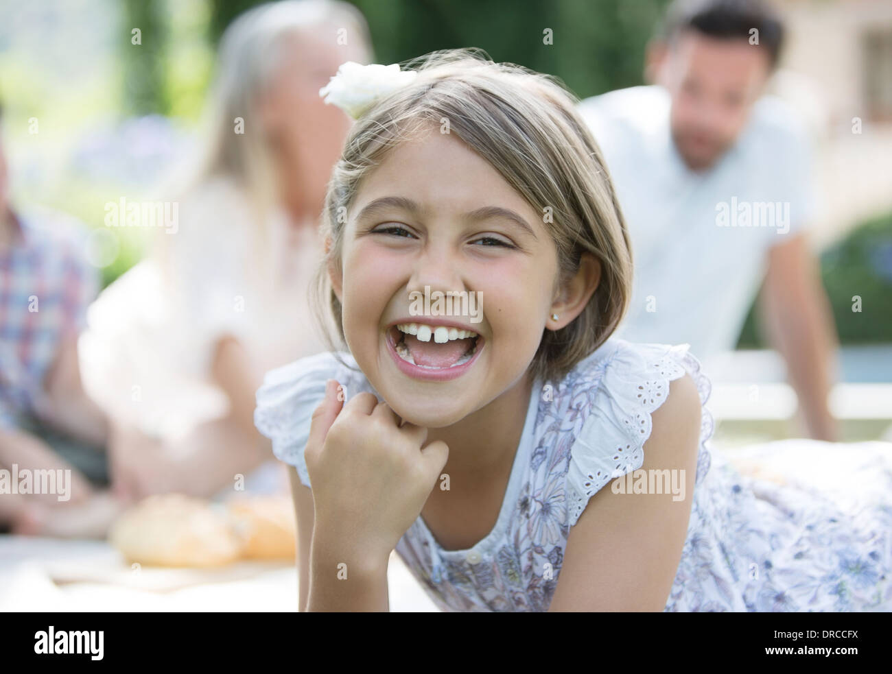 Girl laughing outdoors Stock Photo - Alamy