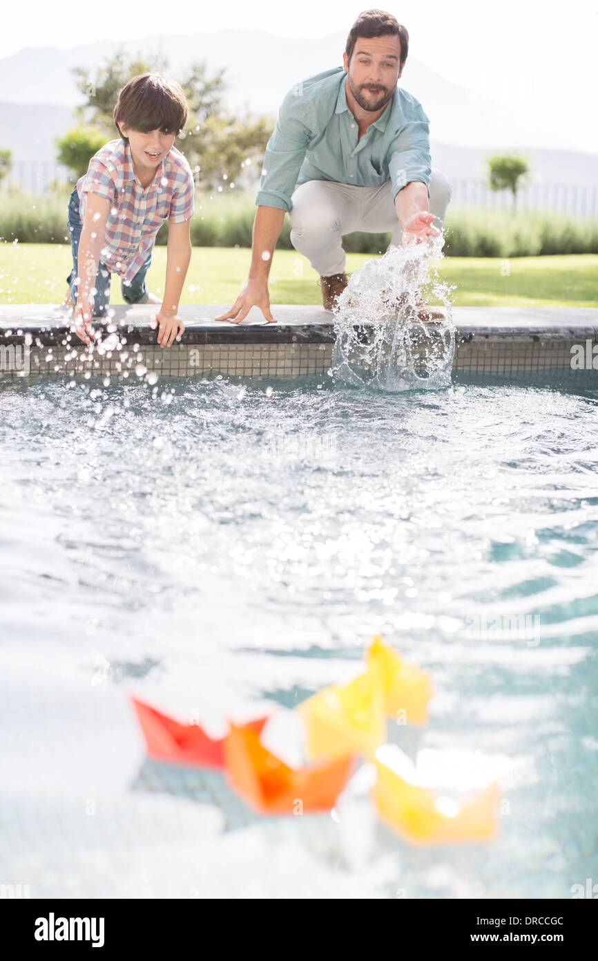 Father and son at swimming pool hi-res stock photography and images - Alamy