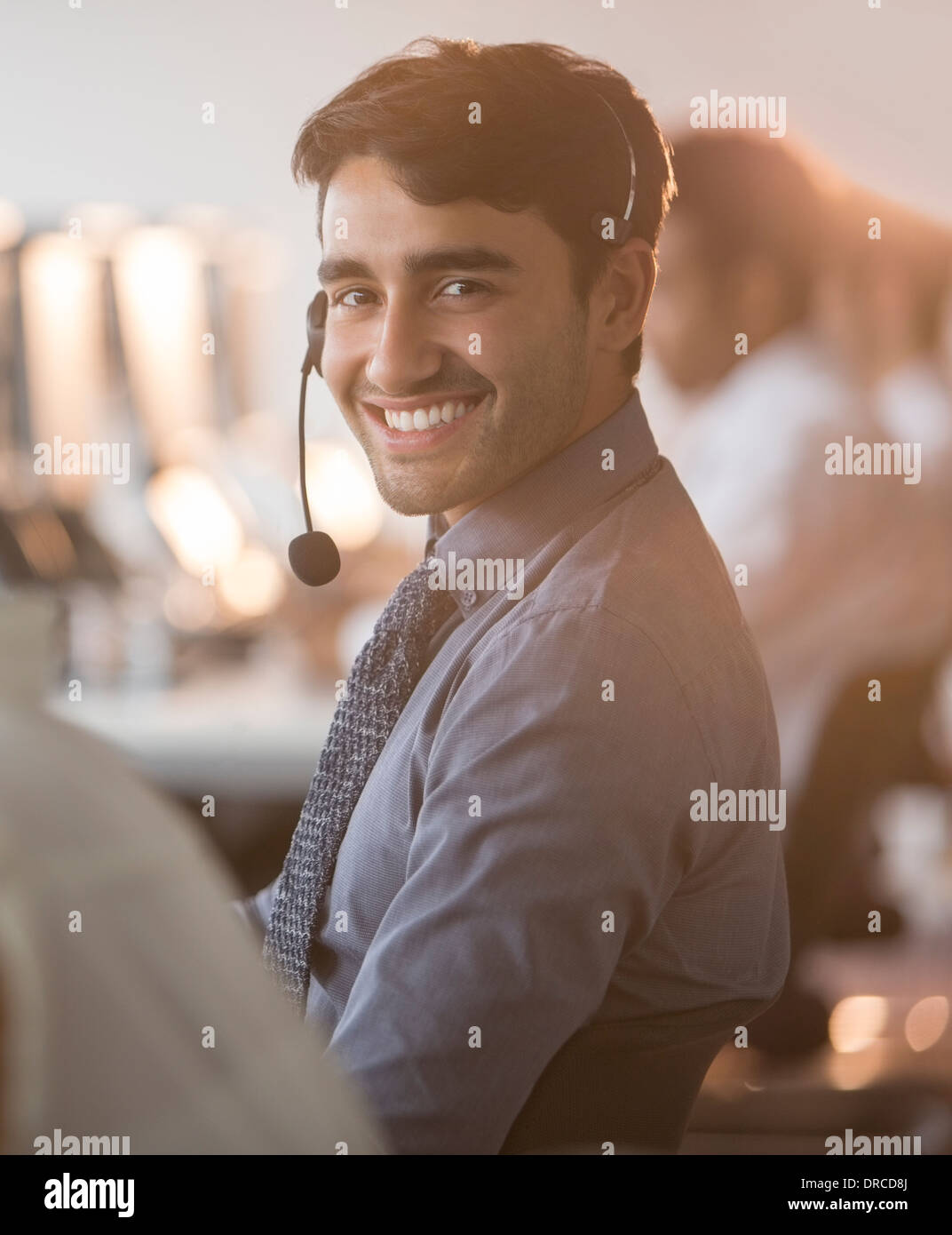 Man wearing headset in office hi-res stock photography and images - Alamy