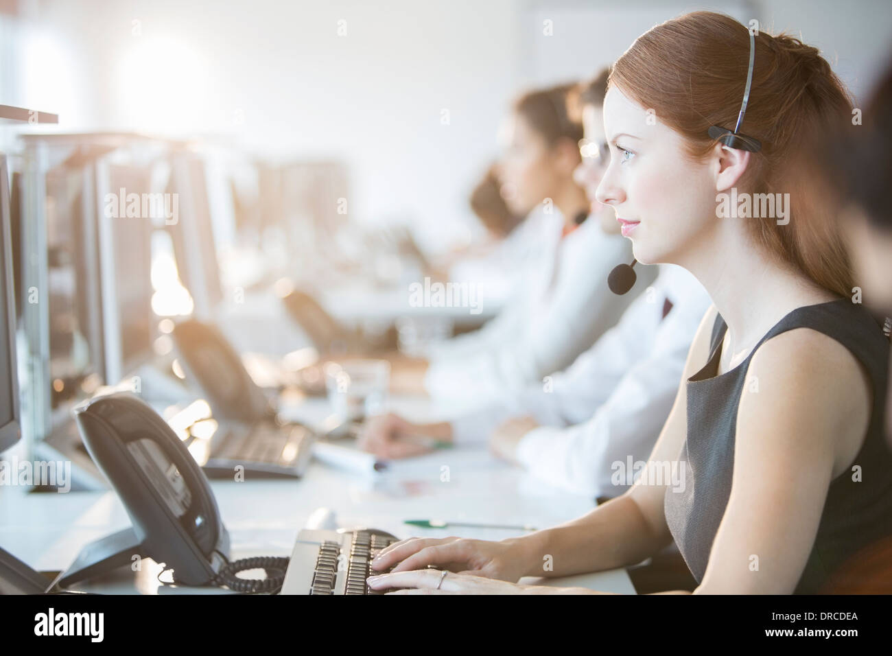 Office worker wearing headset hi-res stock photography and images - Alamy