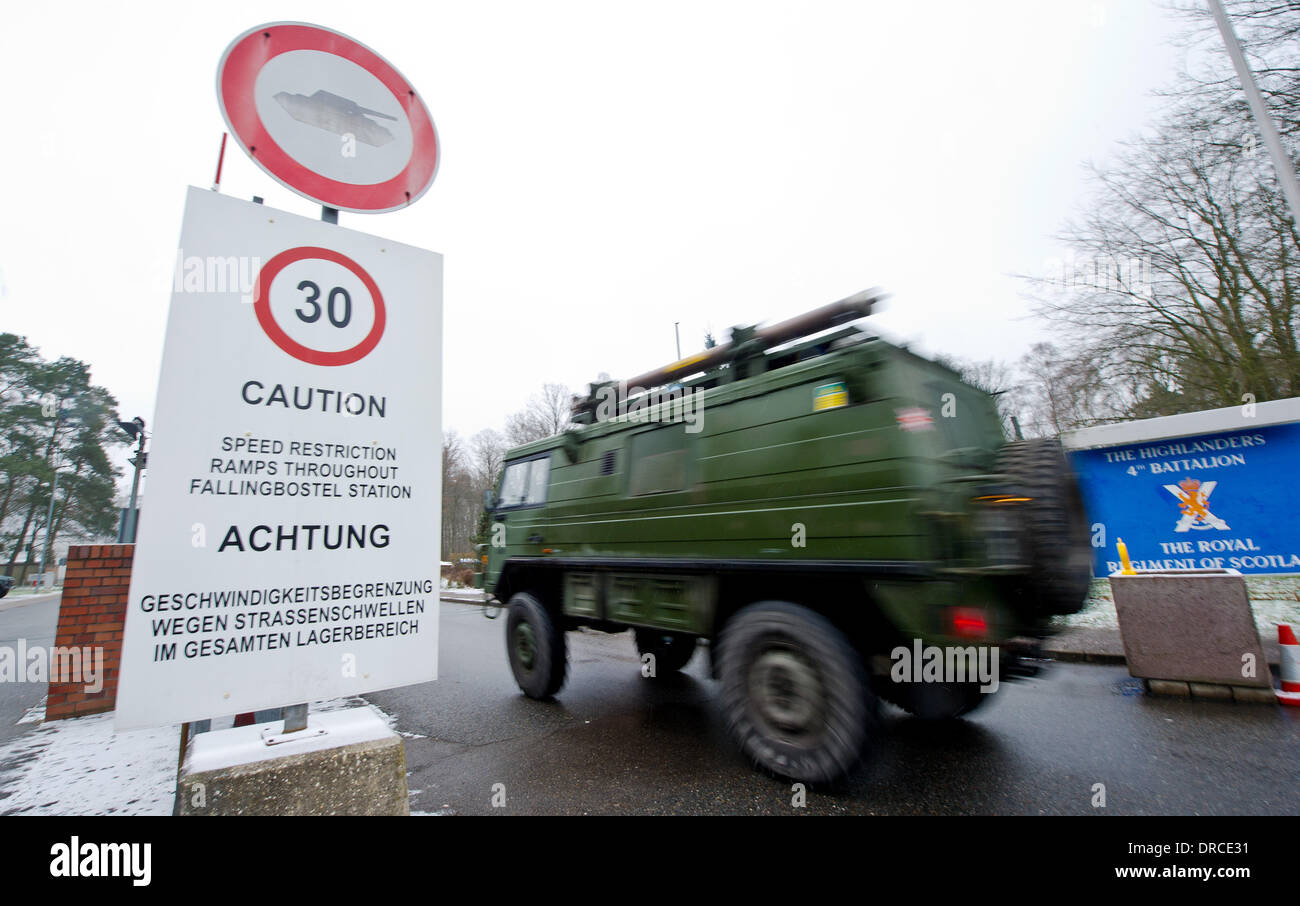 Bergen-Hohne, Germany. 23rd Jan, 2014. A military vehicle is driven ...
