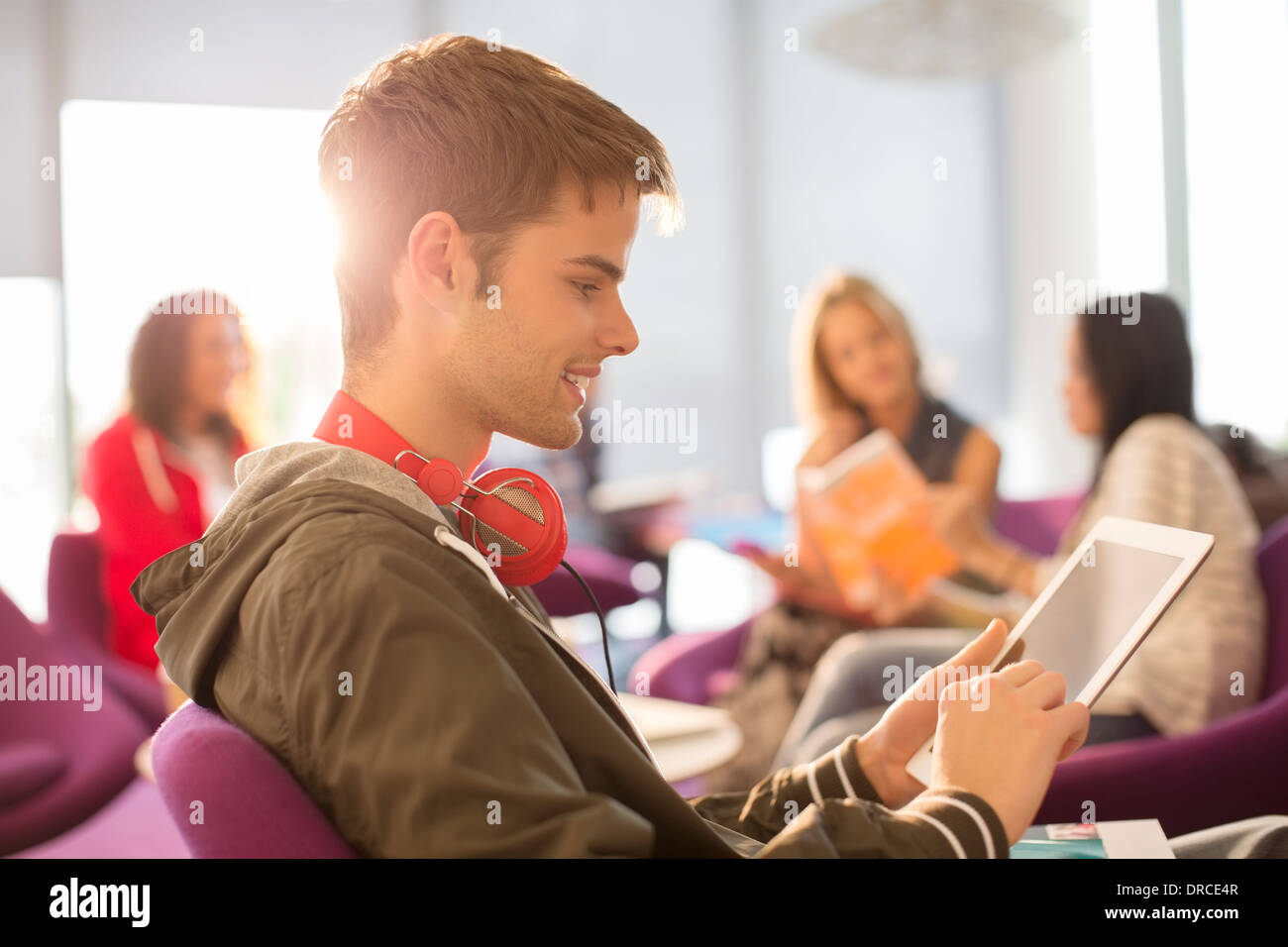 College student using tablet hi-res stock photography and images - Alamy