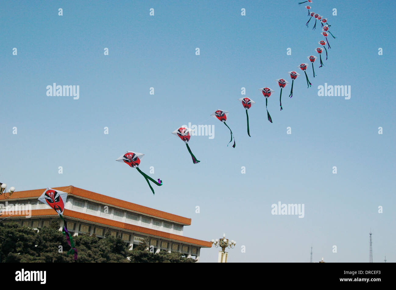Kites floating at sky Stock Photo - Alamy