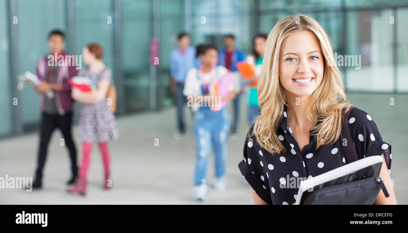 Smiling lady student holding hi-res stock photography and images - Alamy