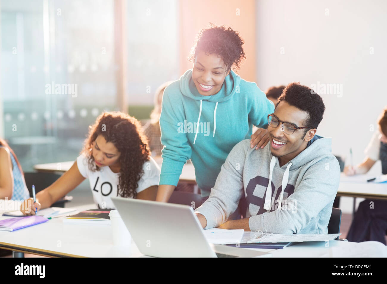 University students working in classroom Stock Photo - Alamy