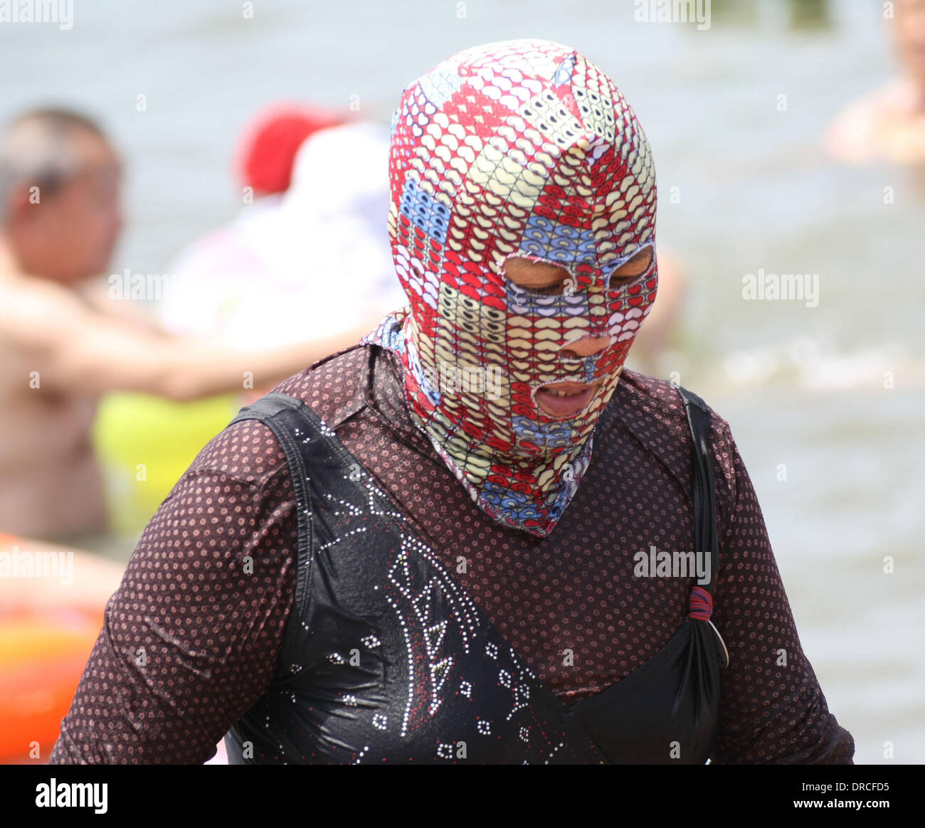 Masked women protected from the sun In China having pale skin is a mark ...