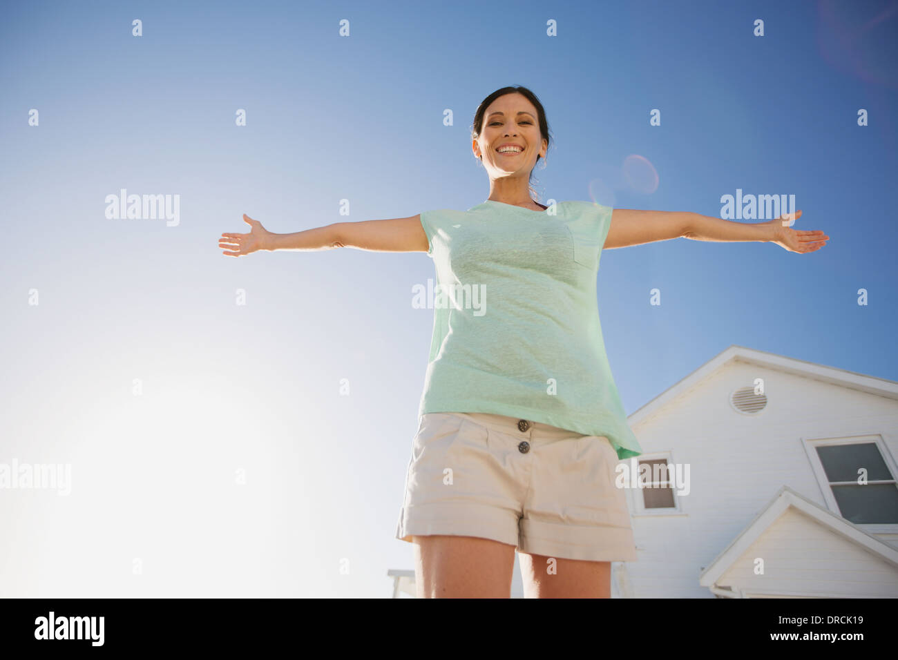 Posing outstretched arms hi-res stock photography and images - Alamy