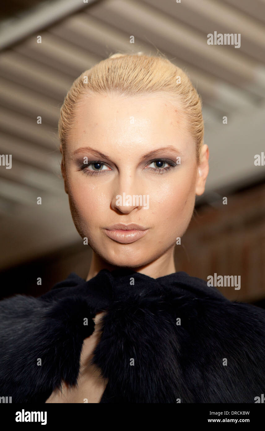 NEW YORK, USA - FEBRUARY 16, 2012: Model prepares backstage for Zuzu ...