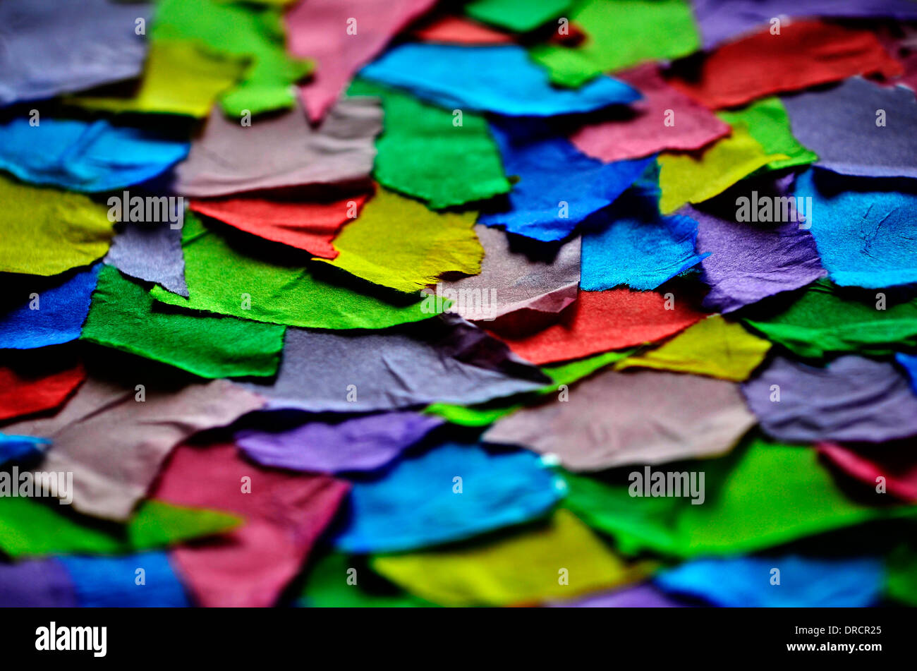 Torn colorful paper shards for art project Stock Photo - Alamy