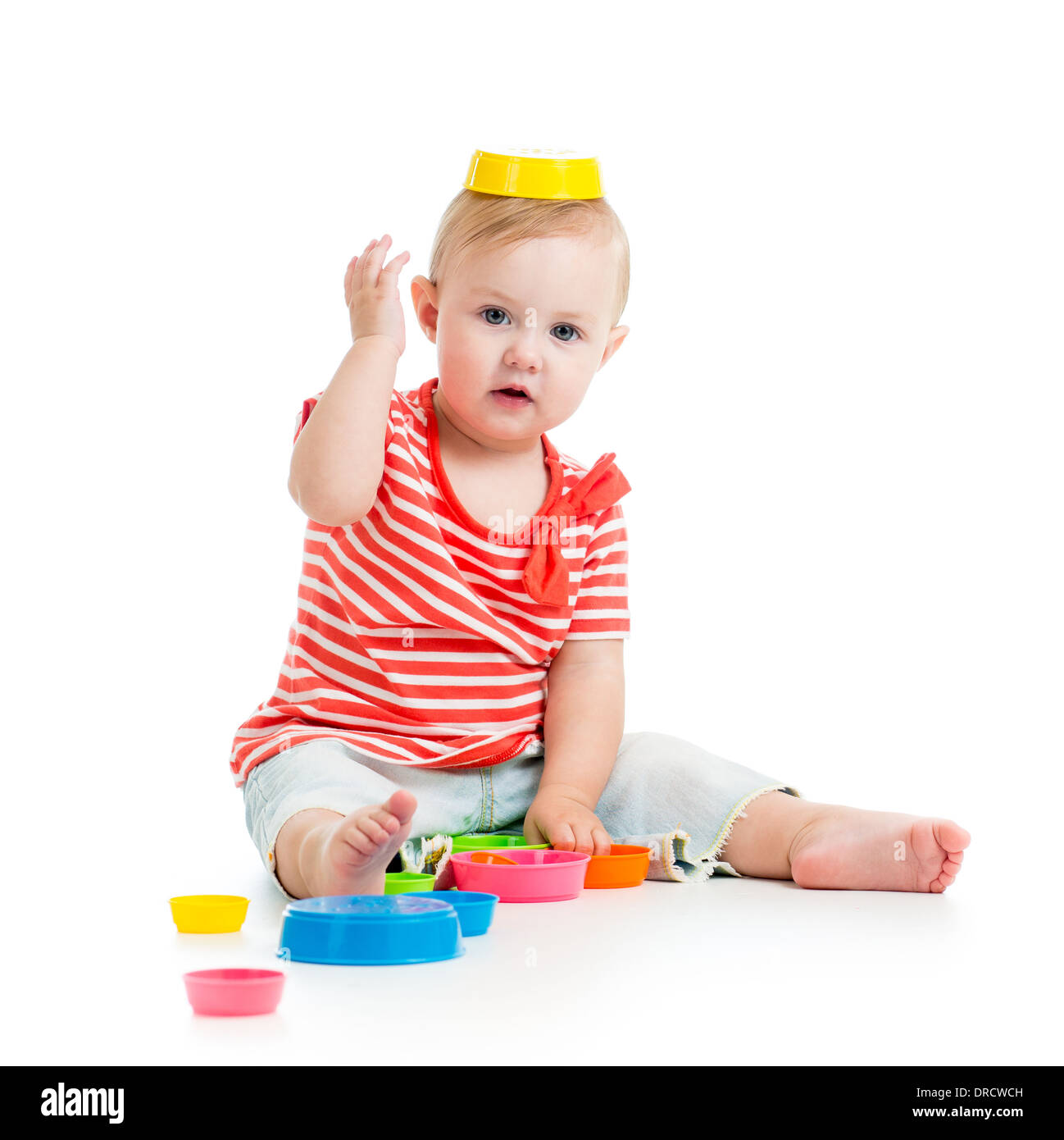 Funny little child playing with toys Stock Photo - Alamy