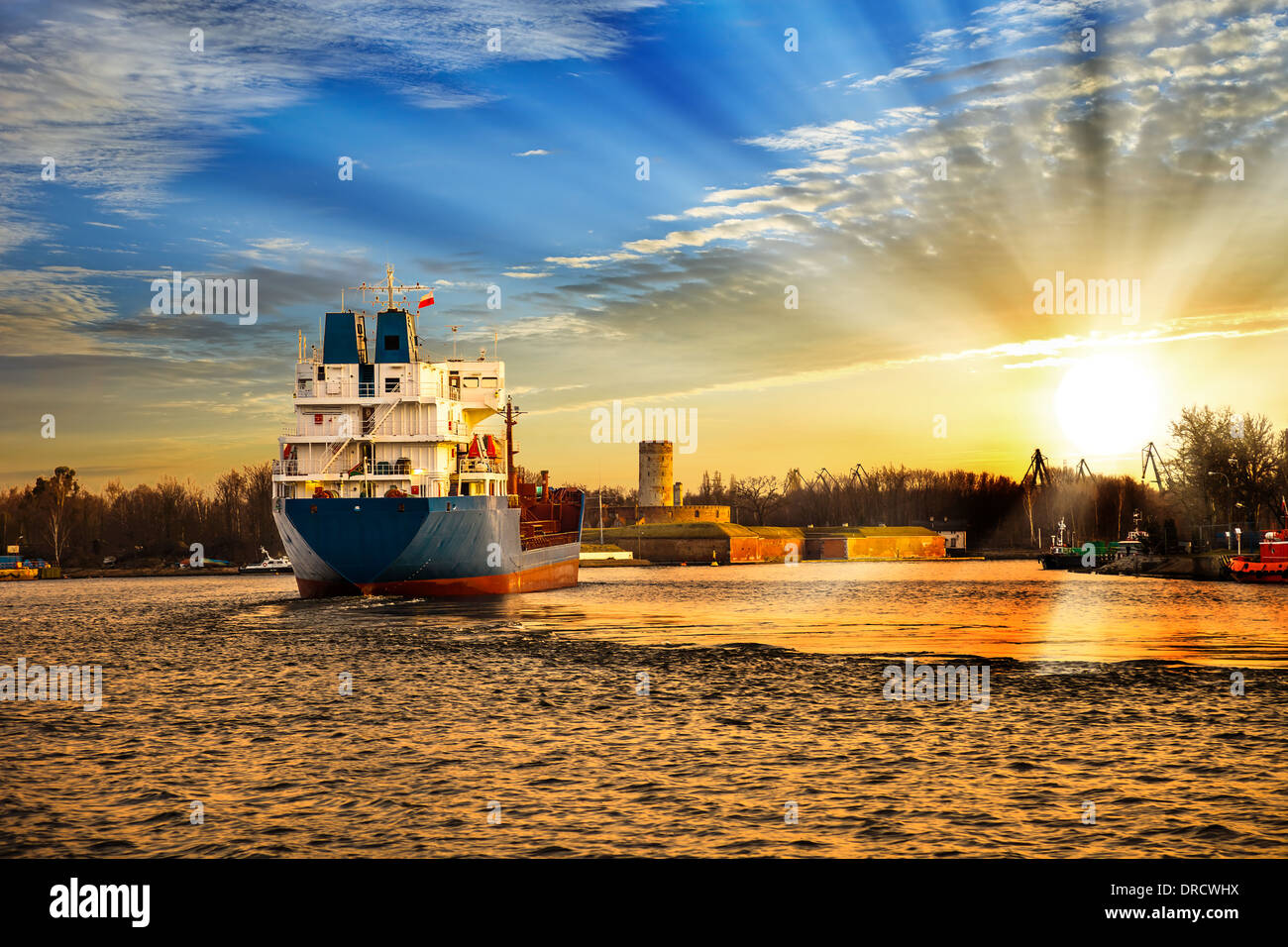 Ship entering the port at sunset in Gdansk, Poland Stock Photo - Alamy