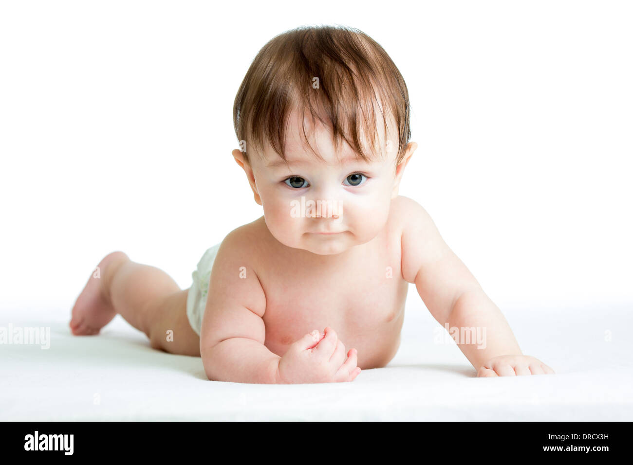 baby boy lying on tummy isolated on white background Stock Photo - Alamy