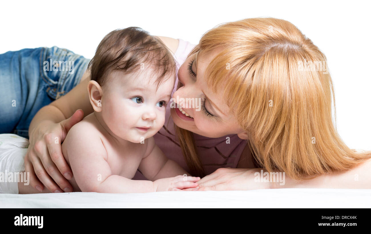 Mother hugging her baby isolated Stock Photo - Alamy