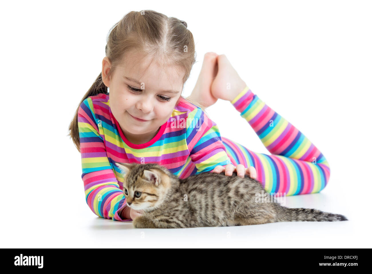 Happy kid girl with cat kitten Stock Photo - Alamy