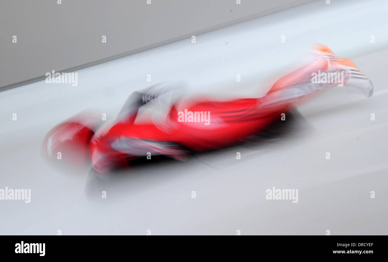 Koenigssee, Germany. 23rd Jan, 2014. A woman rides on a skeleton sled ...