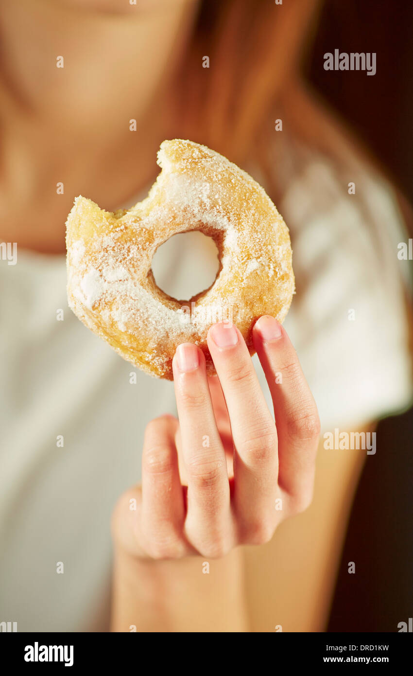 Office eating donut hi-res stock photography and images - Alamy