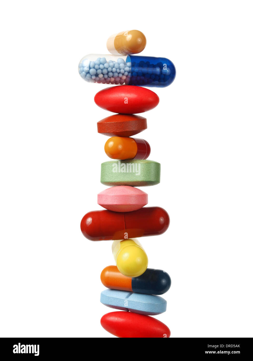 Stack of pills and capsules isolated on white background Stock Photo ...