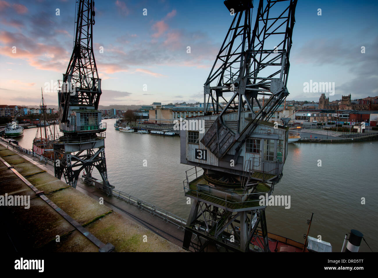 Bristol (UK) docks showing the Centre, cranes, The Mathew ship and John ...
