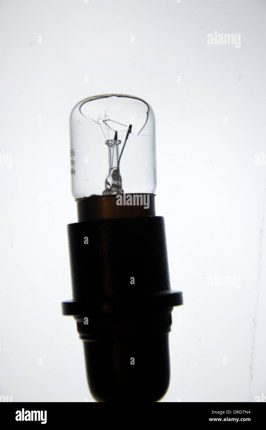 Broken lightbulb on white background, exposed filament Stock Photo - Alamy