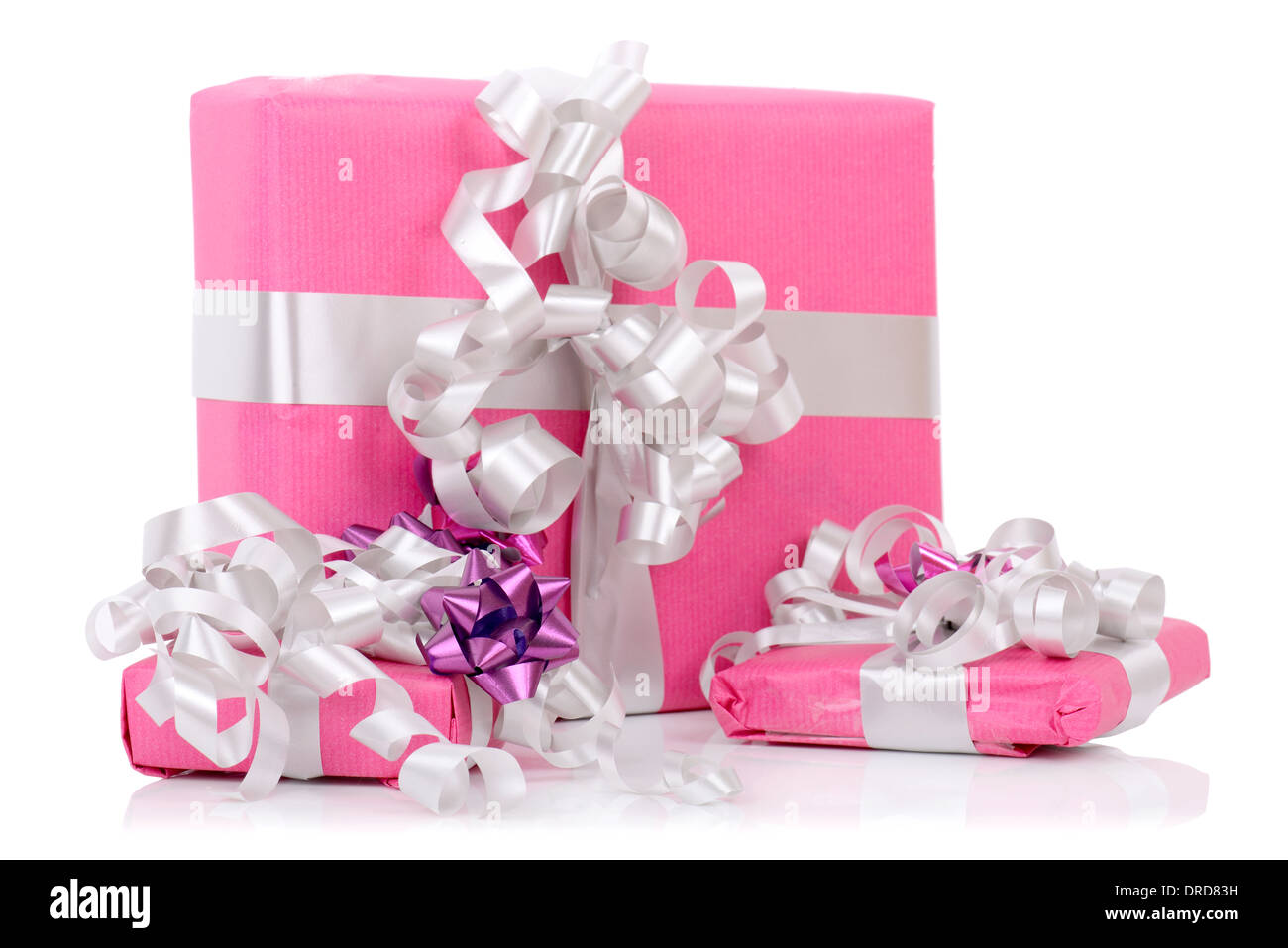 a group of pink wrapped presents isolated on a white background Stock ...