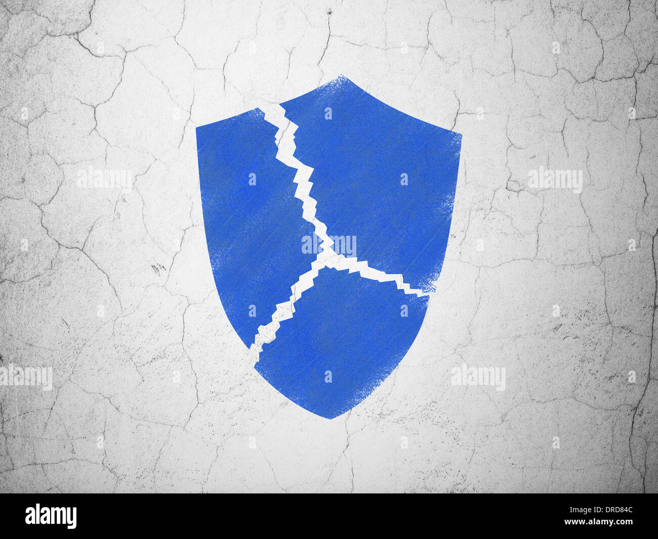 Protection concept: Broken Shield on wall background Stock Photo - Alamy
