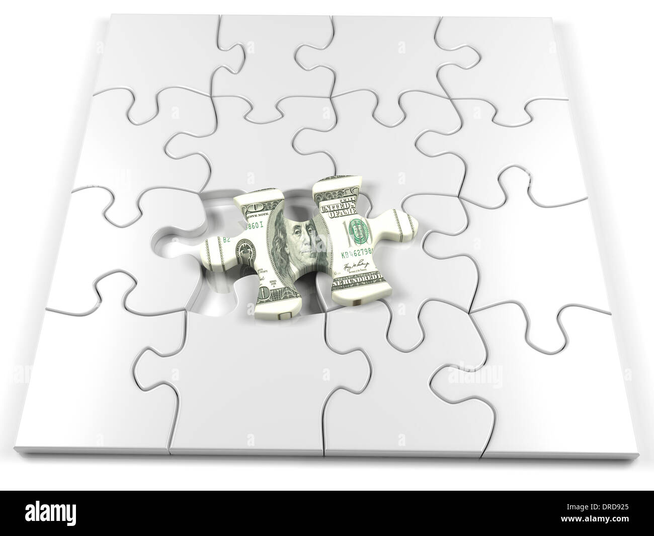 Dollar bill puzzle Cut Out Stock Images & Pictures - Alamy