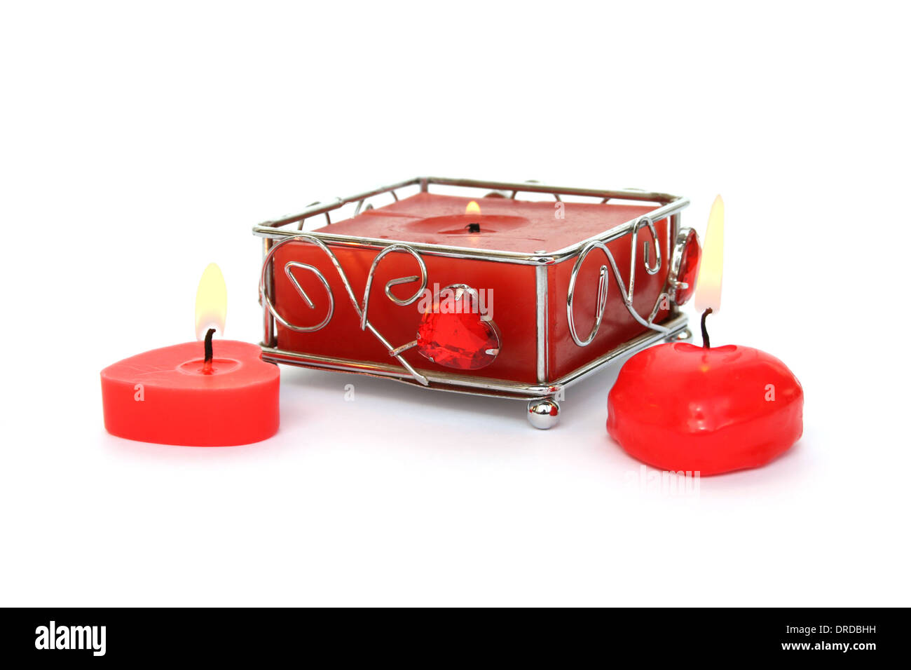 Red candles isolated on white background Stock Photo - Alamy