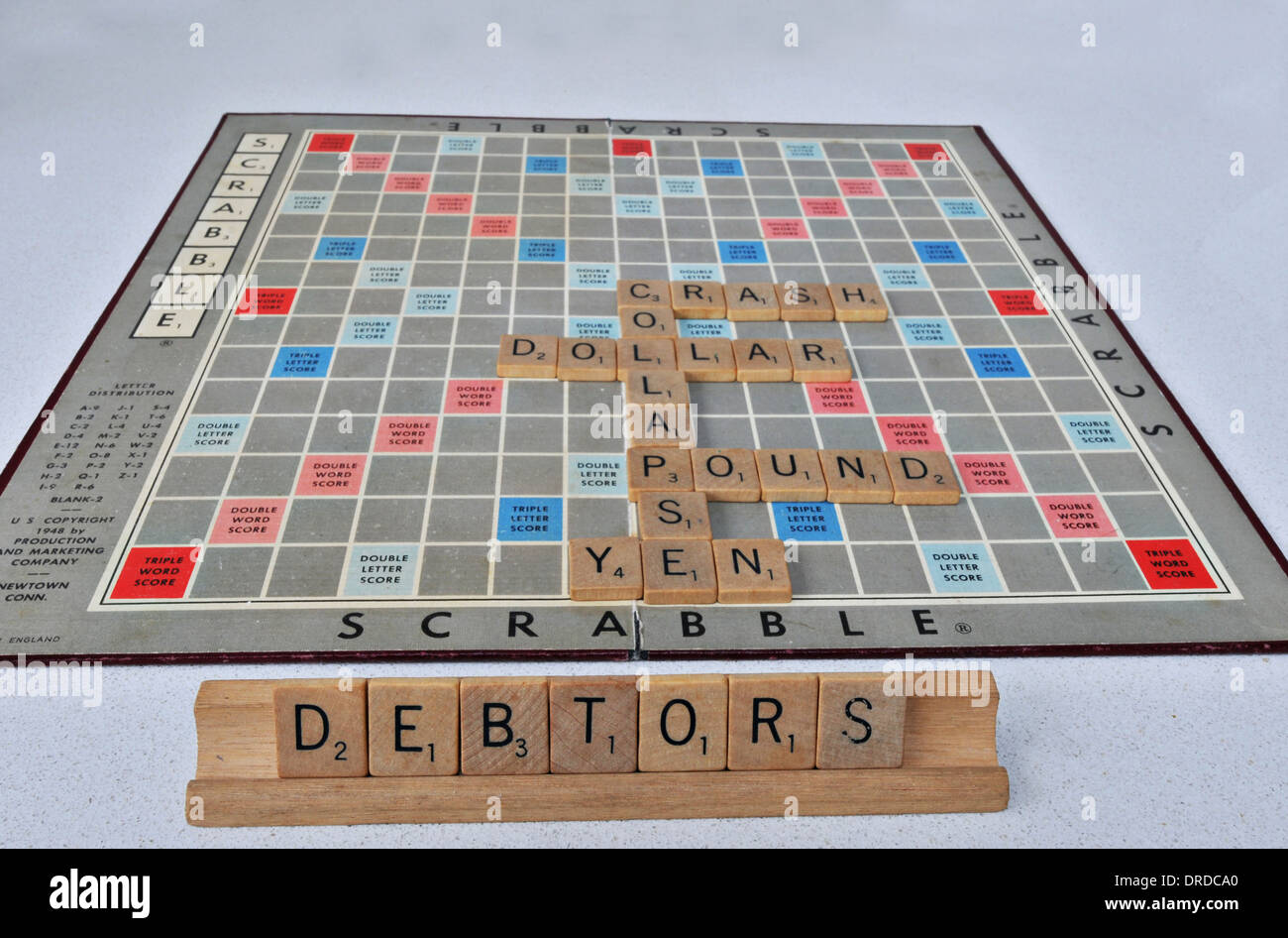 A scrabble board reflects the poor economic situation Stock Photo - Alamy