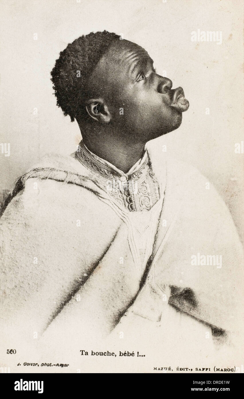 Black Moroccan man pouting Stock Photo - Alamy