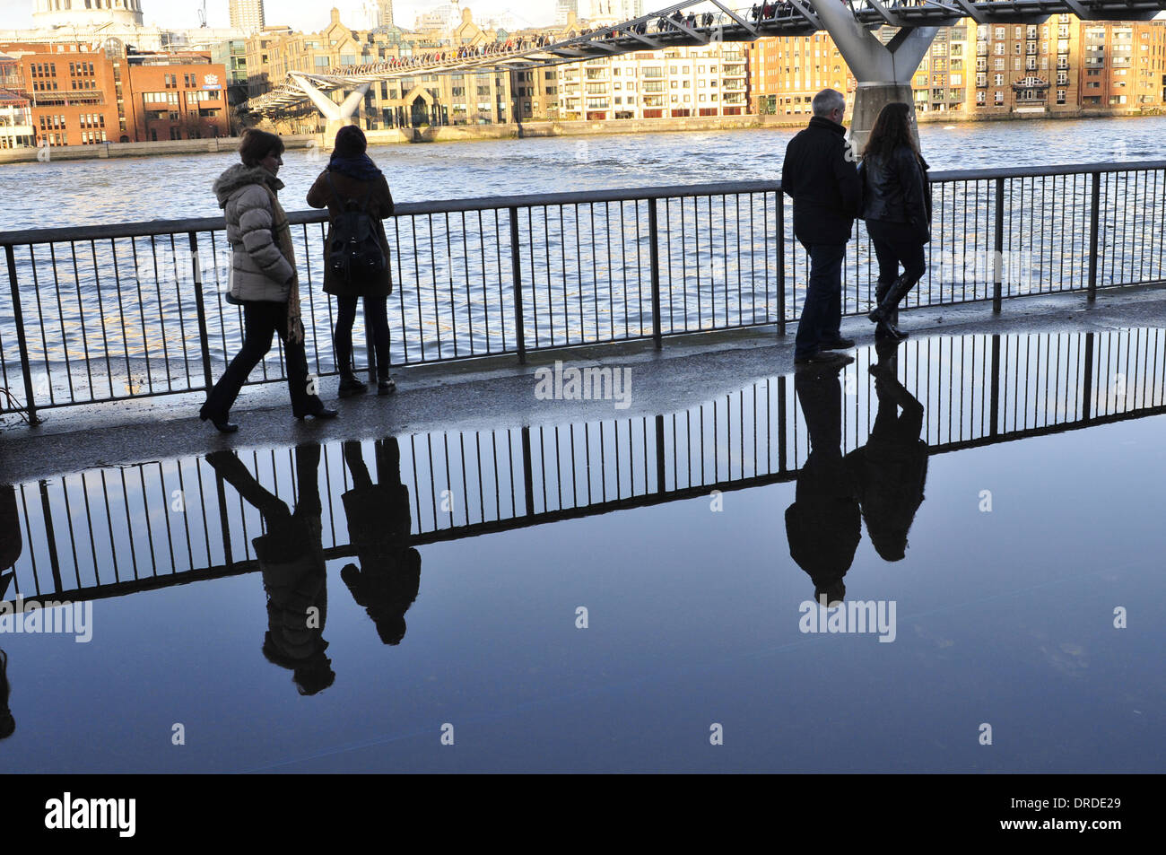 Two couples and and their reflections on water, London, UK Stock Photo ...