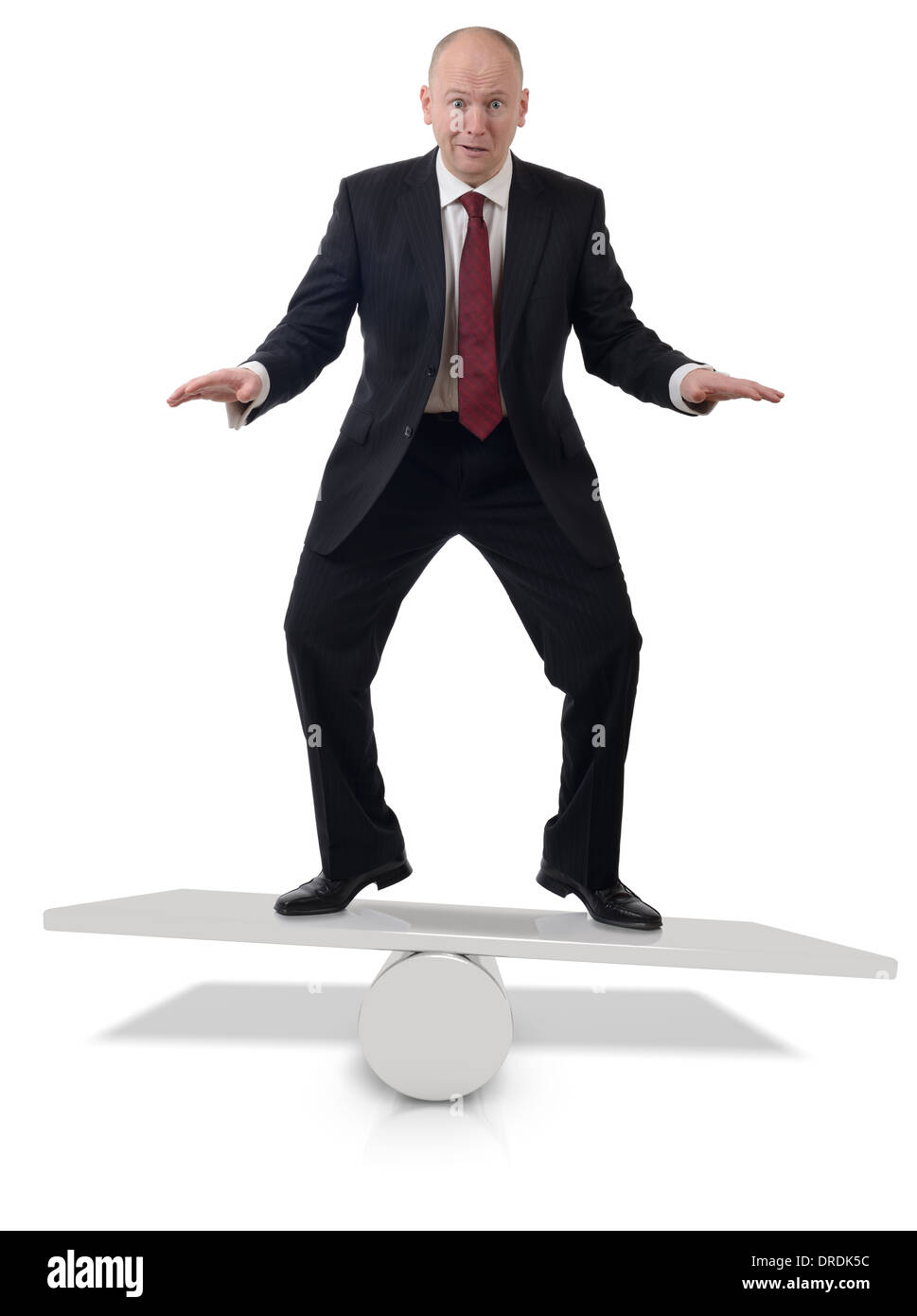 a businessman keeping balance isolated on a white background Stock ...