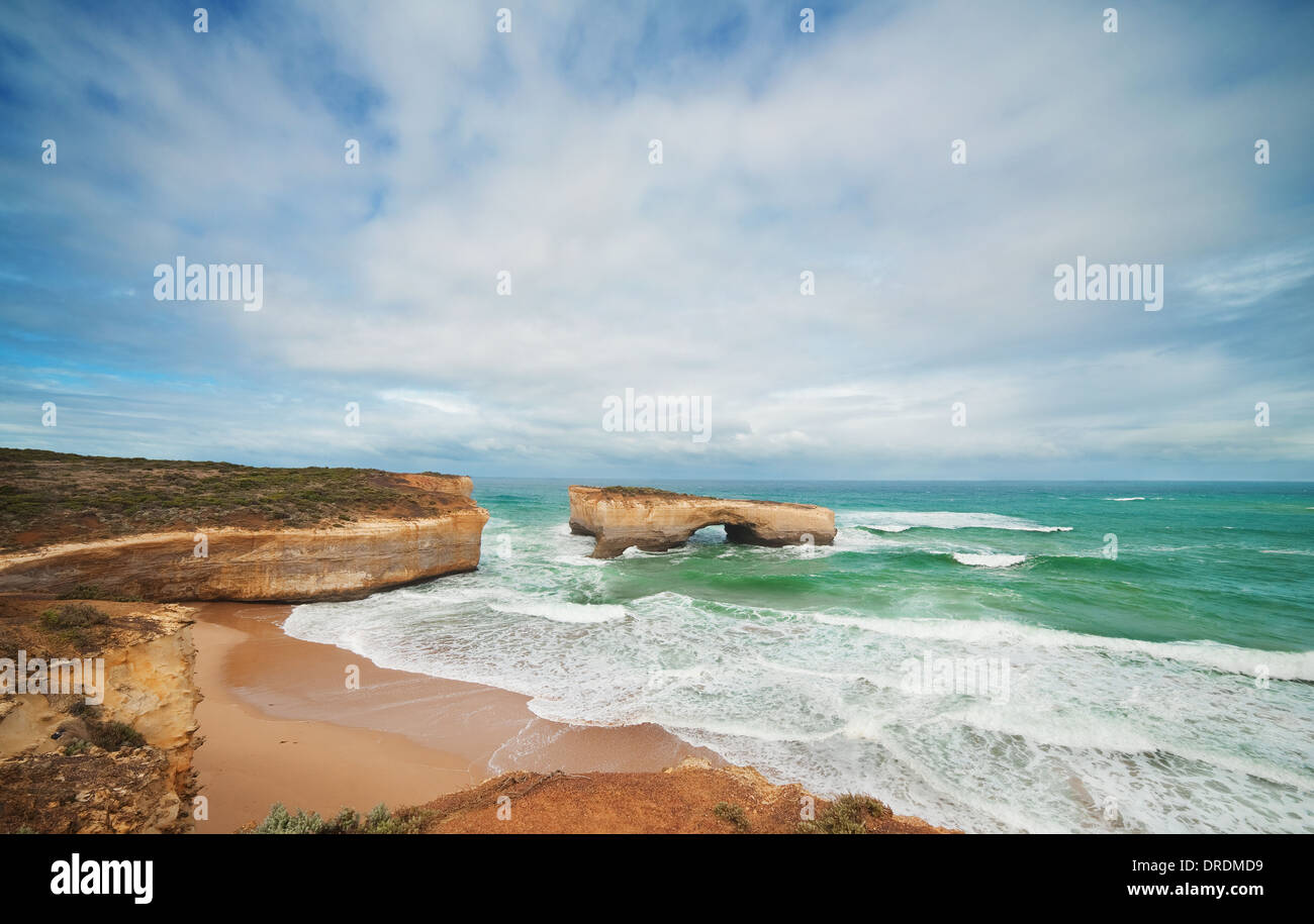 Famous rocks London Bridge in the rain,Great Ocean Road, Australia ...
