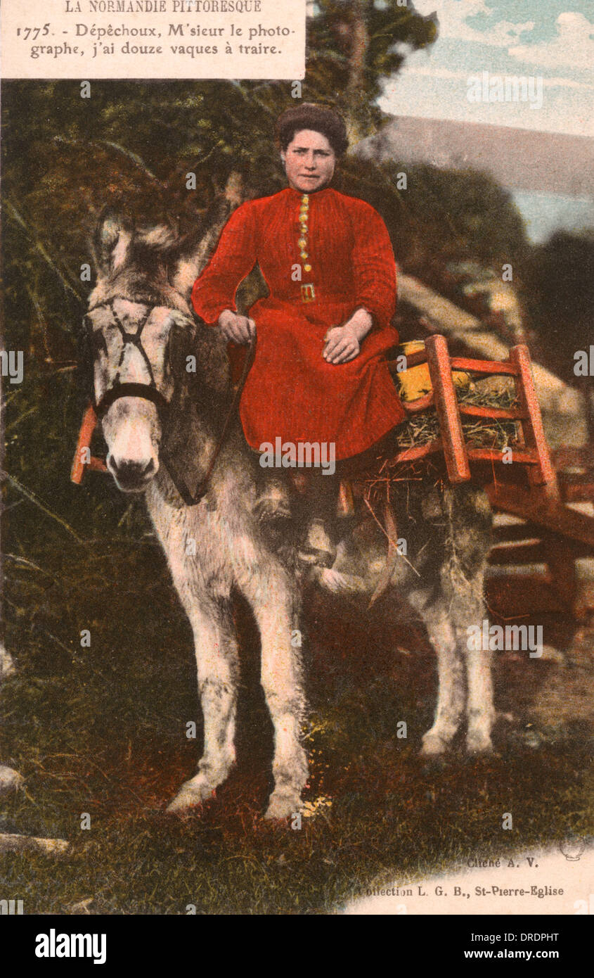 Woman from Normandy riding a mule Stock Photo - Alamy